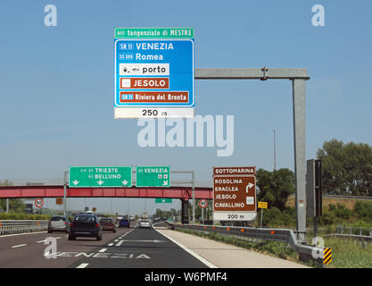 Road junction on italian highway with directions to Rome or Florence in ...