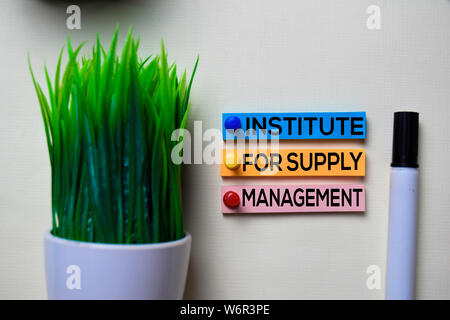 Concept of ISM write on sticky notes isolated on Wooden Table Stock ...