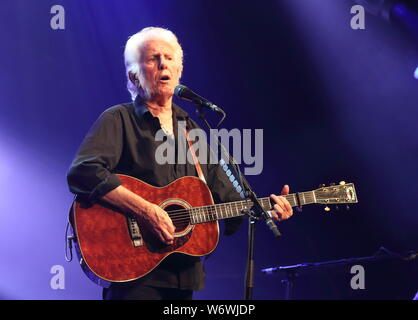 GRAHAM NASH UK rock musician with Susan Sennett at their London home in ...