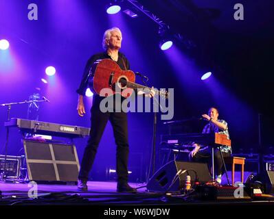 GRAHAM NASH UK rock musician with Susan Sennett at their London home in ...