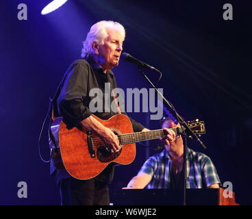 GRAHAM NASH UK rock musician with Susan Sennett at their London home in ...