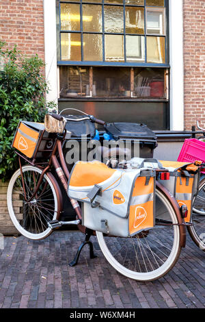 PostNL bicycle. PostNL is a mail, parcel and e-commerce corporation ...