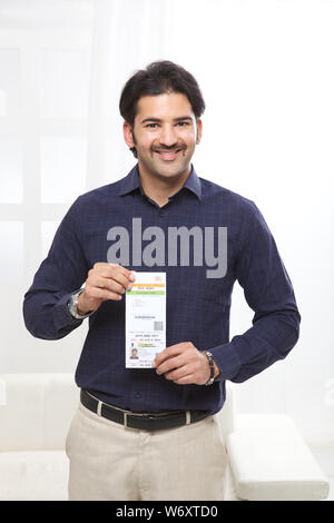 Portrait Of Indian Man Showing Aadhar Card Stock Photo - Alamy
