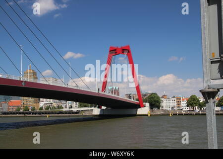 Red ,colored ,Bridge ,called ,Willemsbrug ,river, Nieuwe Maas, connect ...