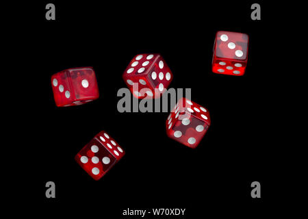 Five white dots on a black background with light defraction in a ...