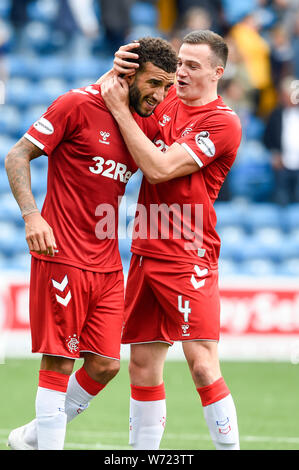 Rangers Connor Goldson (left) celebrates scoring his side's second goal ...