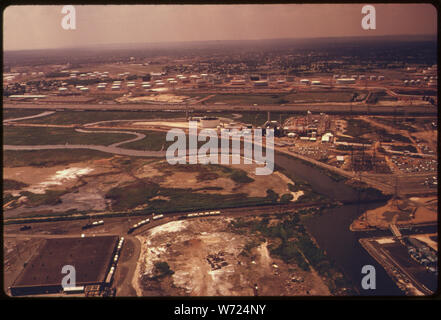 Industrial pollution on the Arthur Kill River in New Jersey ca. June ...