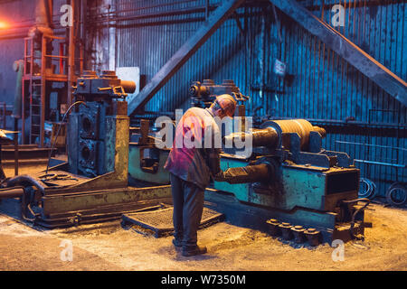 Portrait working young male miner in red cap showing thumbs up ...