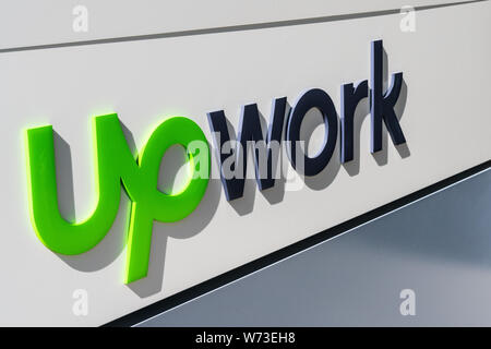 UpWork sign and logo at global freelancing platform company ...