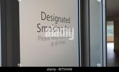 smokers in the designated smoking room at athens airport greece Stock ...