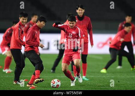 Japanese national soccer players take part in a training session in ...