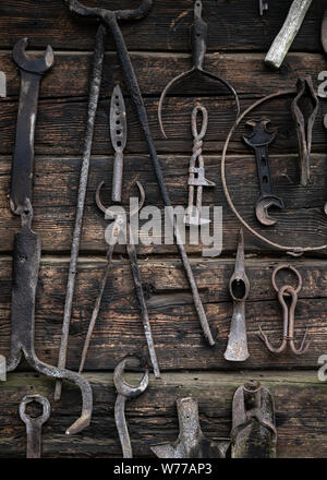 Vintage farmhouse table in rustic kitchen with green pendant lights ...