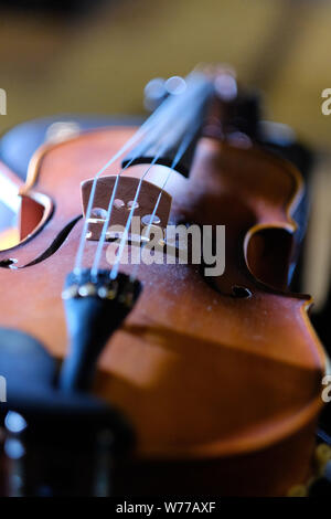 Antique stringed musical instrument is bowed at Renaissance Faire Stock ...