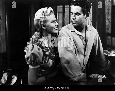 JANIS CARTER, GLENN FORD, FRAMED, 1947 Stock Photo - Alamy