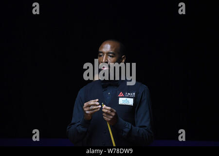 Rory McLeod of England considers a shot to Stephen Maguire of Scotland ...