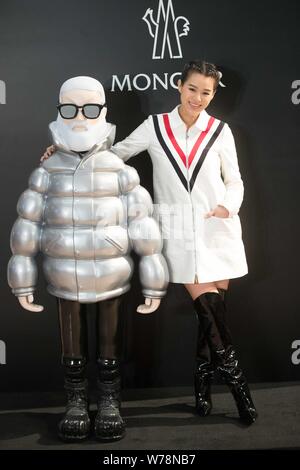 Hong Kong actress and singer Myolie Wu attends an activity in Beijing ...
