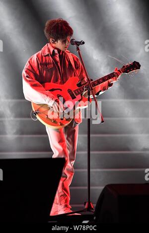 Chinese singer and actor Roy Wang or Wang Yuan of Chinese pop group ...