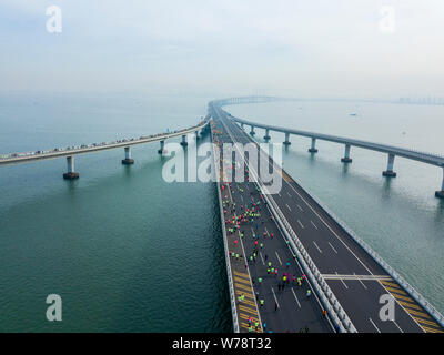 Participants compete in the world's first marathon on the sea on ...