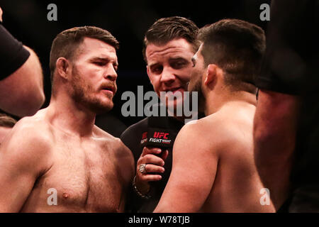 American mixed martial artist Kelvin Gastelum, left, hits British mixed ...