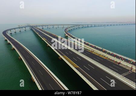 Participants compete in the world's first marathon on the sea on ...