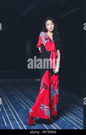 Hong Kong singer and actress Fiona Sit poses for photos during an ...