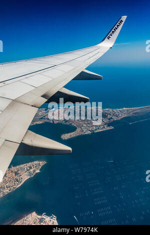 View out the window of a Ryanair Boeing 737-800 flight in the early ...