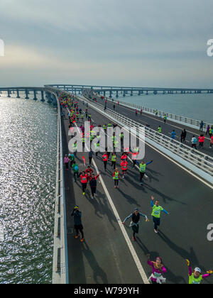 Participants compete in the world's first marathon on the sea on ...