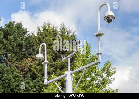 CCTV Security camera outdoor post in street city road isolated on white ...