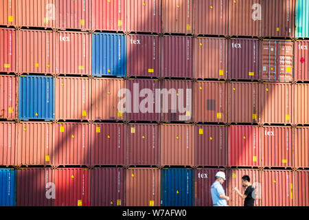 Containers to be shipping abroad are piled up in the Da Chan Bay ...