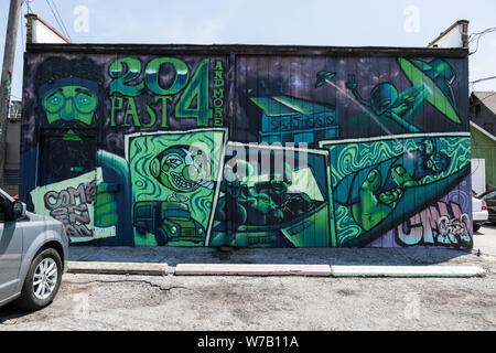 A mural on the back of the 20 Past 4 and More building in Fort Wayne ...