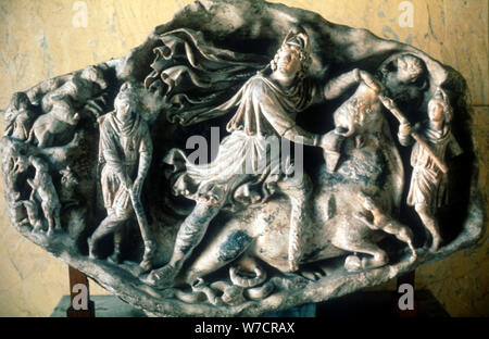 Statue of the god Mithras killing a bull in the thermal s mithraeum in ...