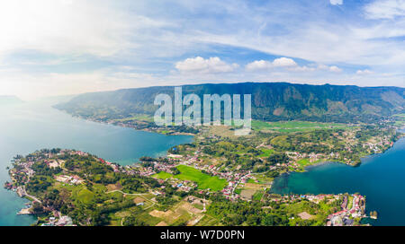 Aerial: lake Toba and Samosir Island view from above Sumatra Indonesia ...