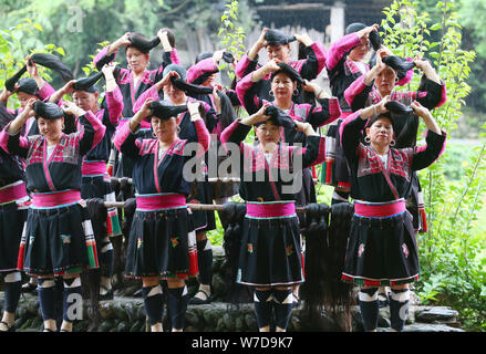 --FILE--Chinese women of Red Yao Ethnic Group dressed in traditional ...