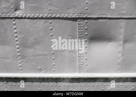 White ship hull, metal sheets with rivets, background photo texture ...