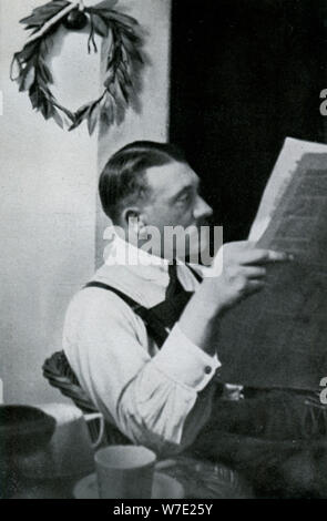 Adolf Hitler reading newspaper in Landsberg prison, 1924. He served ...
