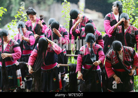 --FILE--Chinese women of Red Yao Ethnic Group dressed in traditional ...