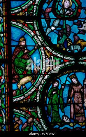 Stained glass window showing Moses and the Ten Commandments inside ...