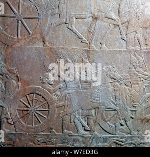 Relief of an Assyrian Chariot. Artist: Unknown Stock Photo - Alamy