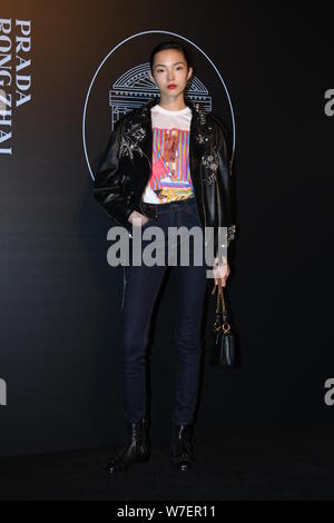 Chinese model Ju Xiaowen poses during the fashion show for Balenciaga ...