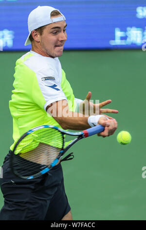 Jan-Lennard Struff, of Germany, returns a shot to Holger Rune, of Denmark, during the second ...