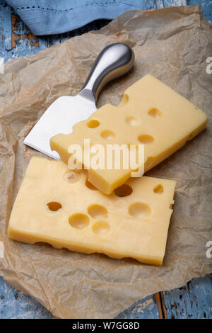 Two blocks of French emmental semi-hard cheese close up Stock Photo - Alamy