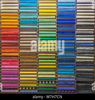samples of multi-colored carpets on the shelves Stock Photo - Alamy