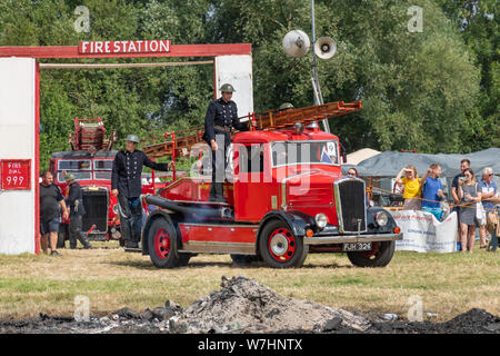 A vintage British Dennis fire engine at the scene of an incident Stock ...
