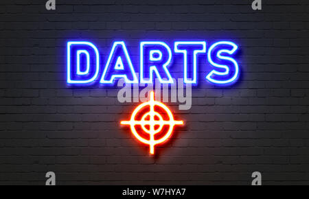 Bullseye neon sign on brick wall background Stock Photo - Alamy