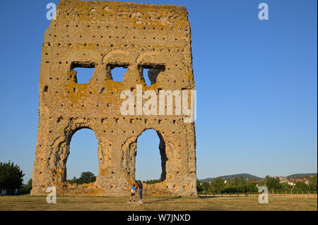 Two children looking at the Janus temple at sunset, Autun FR Stock ...