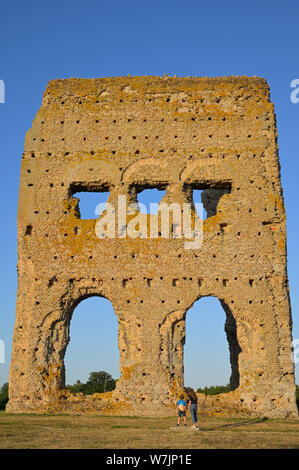 Two children looking at the Janus temple at sunset, Autun FR Stock ...