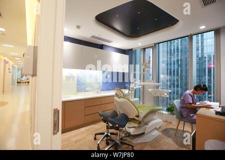 An employee is pictured at the Quancheng International Medical Center ...