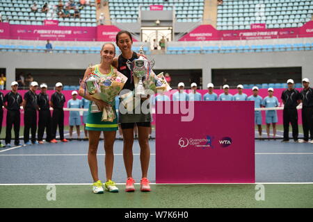 Zhang Shuai of China, right, and Aleksandra Krunic of Serbia pose with ...