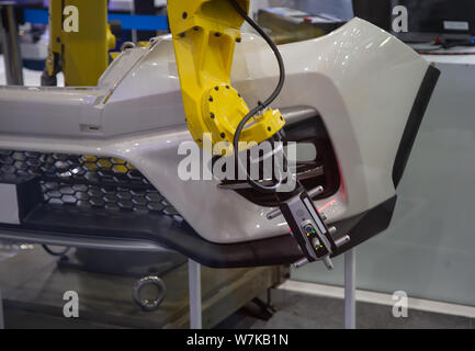 Automated robotic arm CMM scanning in automotive industry Stock Photo ...