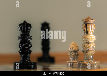 A chess board with pieces. There is an equal intellectual tactical ...